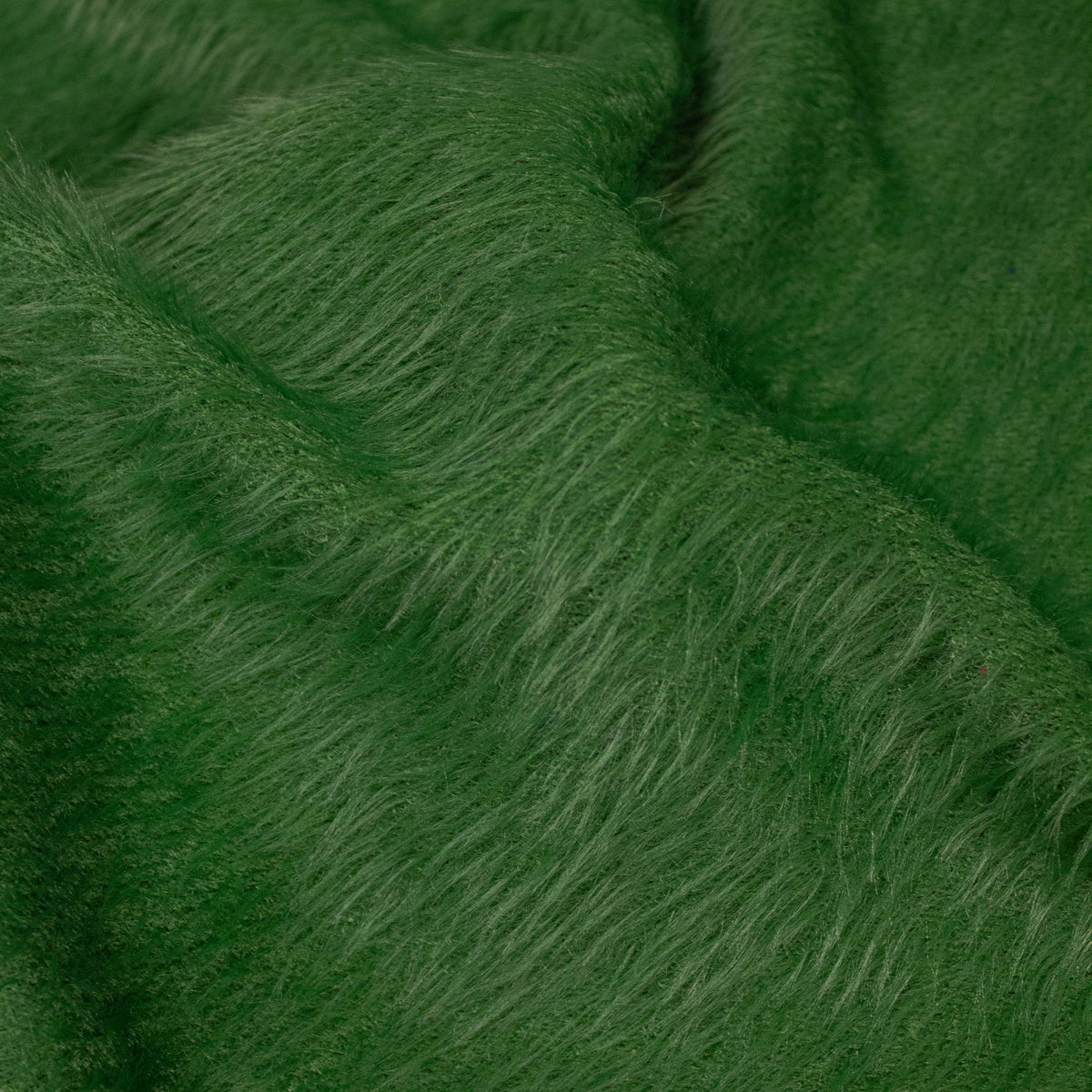 Odyn Green Fluffy Polyester Stretch Fabric | THE FABRIC SALES