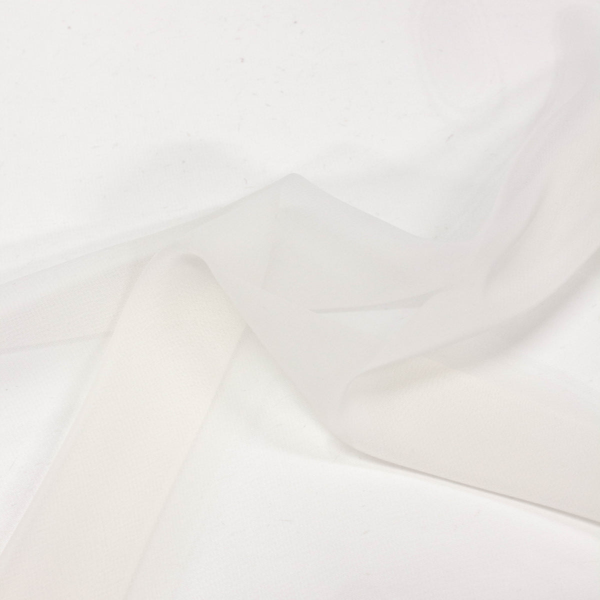 Karim Ivory White Polyester Voile Fabric | THE FABRIC SALES