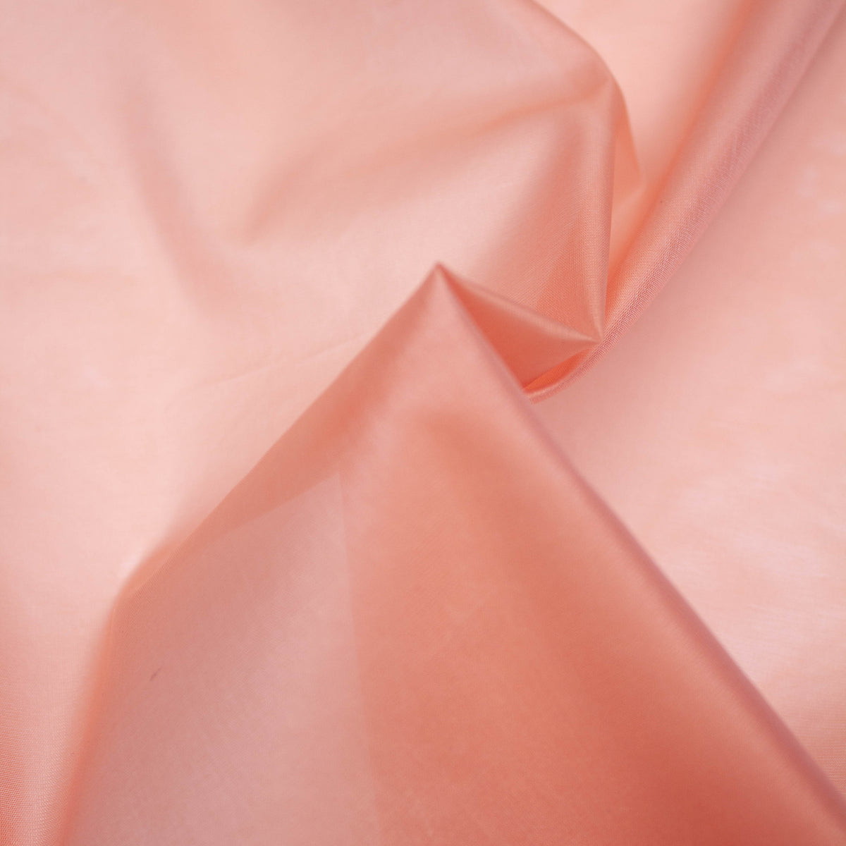 Adeline Salmon Polyester Voile Sateen Fabric | THE FABRIC SALES