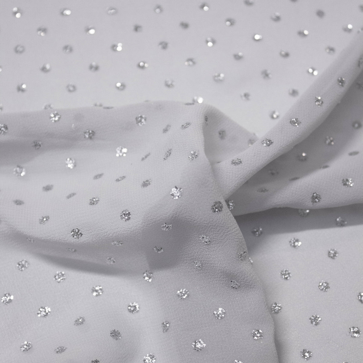 Mocky Light Grey Polyester Voile Silver Polka Dot Fabric | THE FABRIC SALES